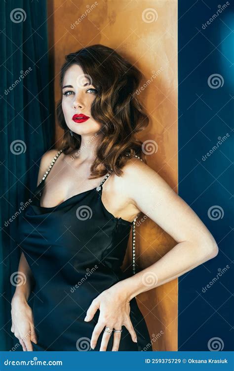 Portrait Of Tempting Beautiful Young Woman In Black Swimsuit Royalty