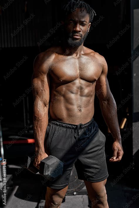 Powerful Black Athletic Men Pumping Up Muscles Workout Bodybuilding