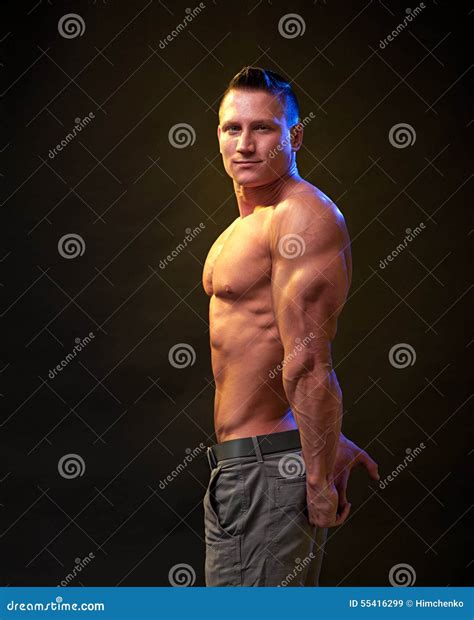 Man Showing Triceps Muscle Stock Image Image Of Studio 55416299