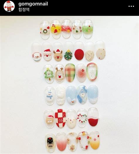 Xmas Nails에 있는 Trang Lee님의 핀 2024 크리스마스 네일 아트 한국 네일 아트 겨울 손톱