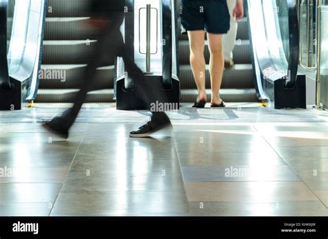 People Legs On Escalator Motion Blurred Front View Abstract Blur
