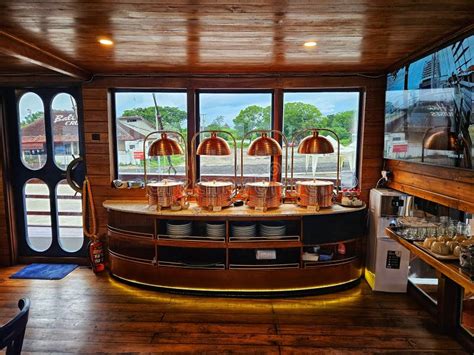 Rustic Buffet Setup With Warm Lighting Editorial Photo Image Of