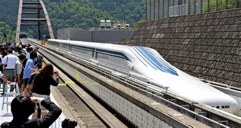 First Passengers Ride On Japans 311mph Floating Maglev Train Trem