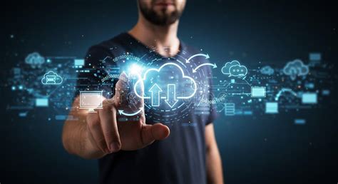 A Person Interacts With A Digital Interface Featuring Cloud Computing