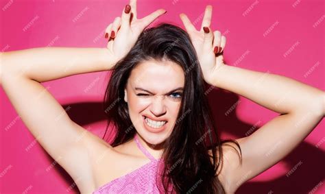 Premium Photo Crazy Funny Sexy Girl Doing Funny Gesture With Finger