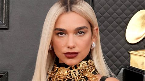 Dua Lipa Sizzles In Slinky Versace Bondage Dress At Grammy Awards