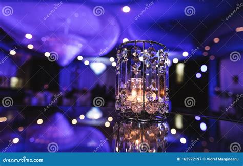 Glass Candle Light On Background Of The Purple Events Room Crystal