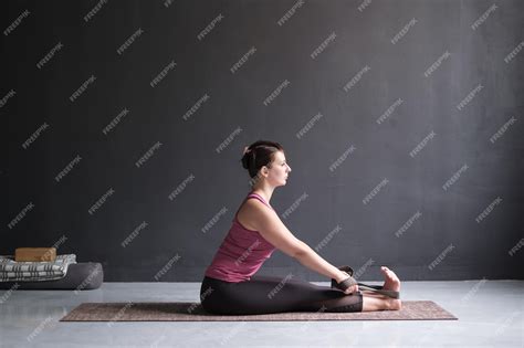 Premium Photo Woman Practicing Yoga Seated Forward Bend Pose