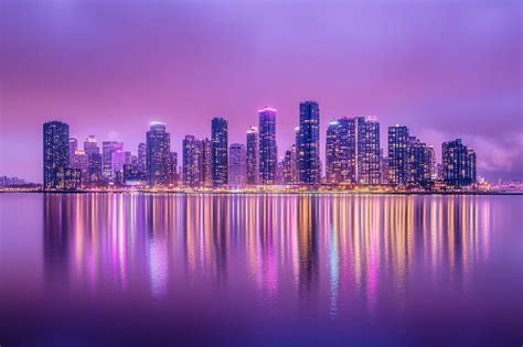 Purple City Skyline With Neon Lights Premium Ai Generated Image