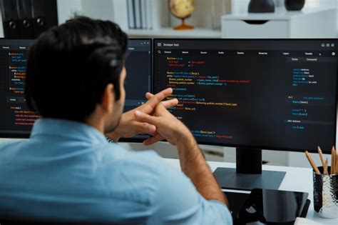 Premium Photo Concentrating In Smart It Developer Working Coding On Two Pc Screen Surmise