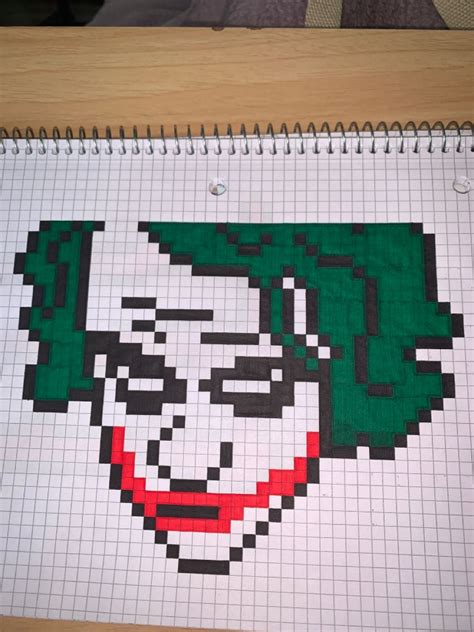 The Joker Pixel Art In 2025 Pixel Art Graph Paper Art Pixel Art Grid