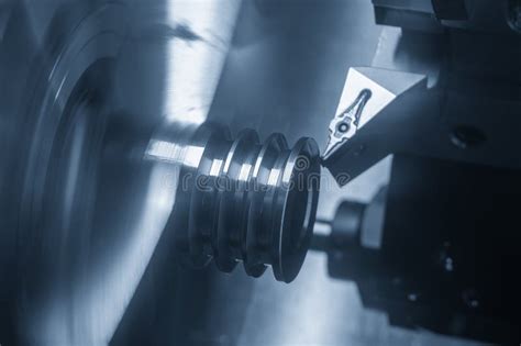 The Cnc Lathe Machine Forming Cutting The Metal Shaft Parts Stock Image
