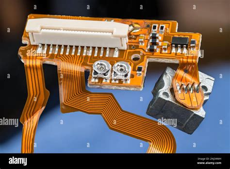 Orange Printed Circuit Board With Flex Ribbon Cables Small Electronic Components And White