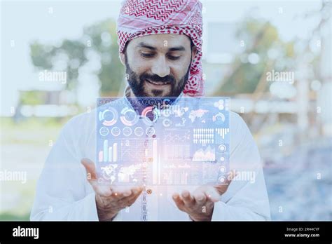Arab Businessman Asset Investor Looking At Overlay Business Information