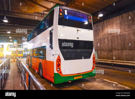 Double Decker City Shuttle Bus At An Stopped At Stop To Drop Off Pick