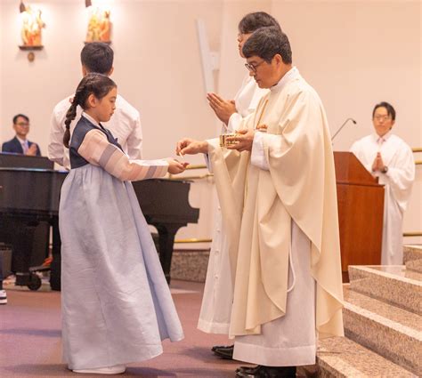 Praying And Then Eating Together Korean Catholics Celebrate St Andrew