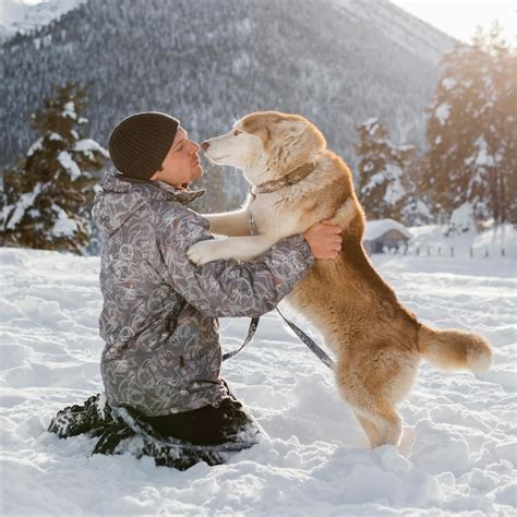 Free Photo Full Shot Man Playing With Dog