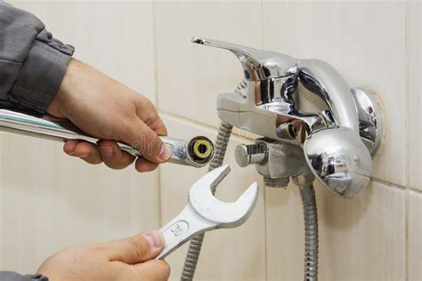 Plumber Hands Fixing Water Tap With Spanner Stock Image Image Of