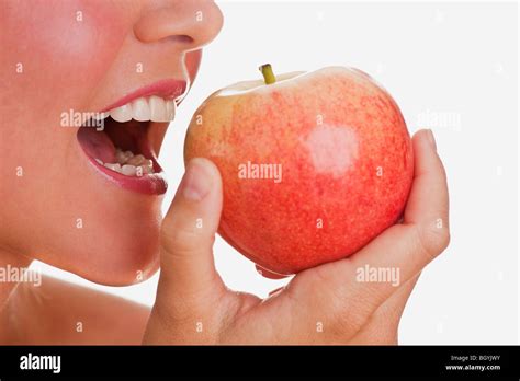 Woman Eating Apple Stock Photo Alamy Woman Eating Apple Stock Photo Alamy