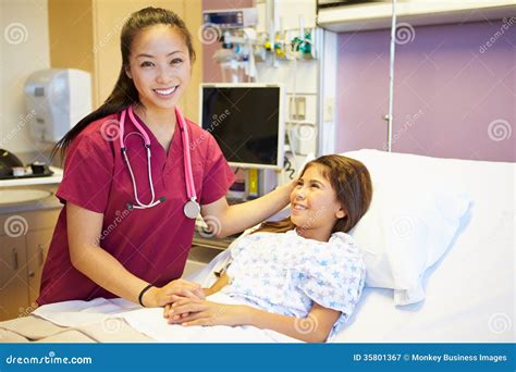 Young Girl Talking To Female Nurse In Hospital Room Stock Image Image