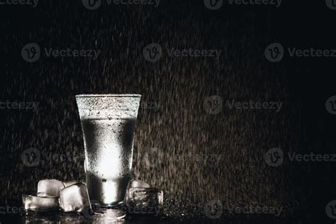 Vodka Shots Glasses With Vodka With Ice Dark Background Copy Space Selective Focus