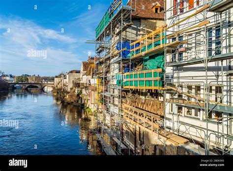 Altrad Modular Scaffolding On Backs Of Houses Being Renovated Above Wide River Argenton Sur
