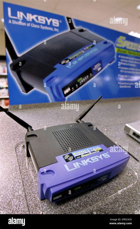 A Linksys Wireless Modem Made By Cisco Systems Inc Is Shown On Sale