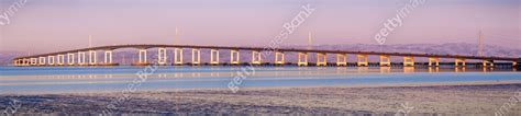 Panoramic View Of San Mateo Bridge At Sunset Electricity Towers And