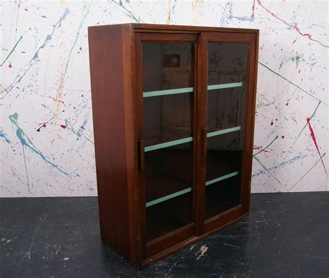 Wooden Cabinet With Glass Sliding Doors Blue Ticking