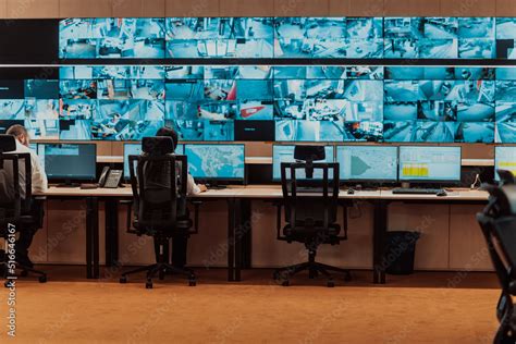 Empty Interior Of Big Modern Security System Control Room Workstation