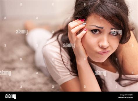 Funny Expression Of A Worried Or Sad Woman That Has Some Doubts Stock