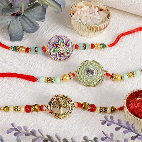 Send Three Floral Rakhi Set Online