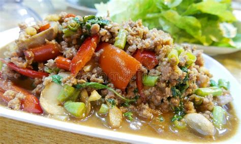 Larb Kai Thai Cuisine Spicy Salad Of Roasted Chicken With Chili Sauce Steamed Rice On White