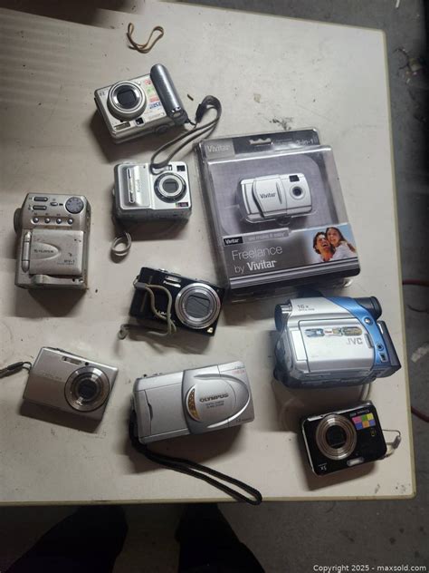 Assorted Digital Cameras And Camcorder Maxsold