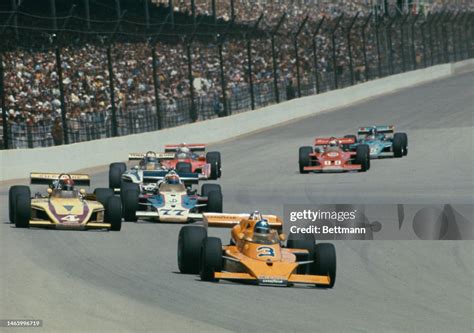 American Racing Driver Johnny Rutherford Driving Car Number 3 To Win