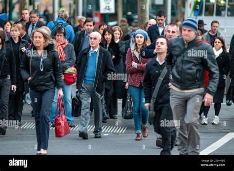 Homeward Bound Commuters At The Pedestrian Crossing Outside Flinders