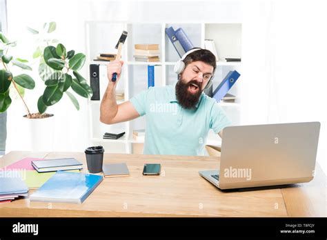 Hate Office Routine Man Bearded Guy Headphones Office Swing Hammer On Computer Slow Internet
