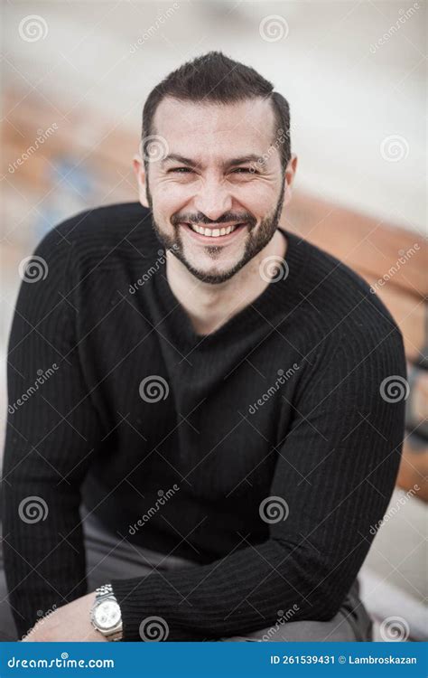 Natural Looking Guy Posing Outdoors Wearing Casual Clothes Stock Image