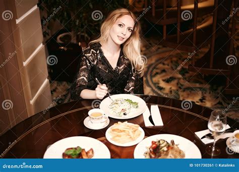 Beautiful Woman Eating In A Dining Room Stock Image Image Of Dinner