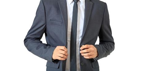 Joven Hombre De Negocios En Traje Gris Aislado Contra Fondo