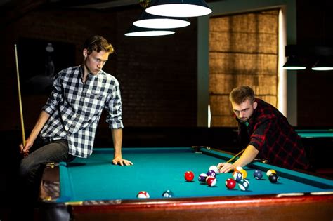 Free Photo Medium Shot Guy Sitting On Pool Table