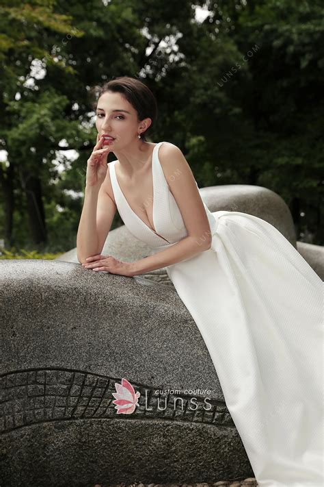 Plunging V Neck A Line Texured Wedding Gown With Pockets Lunss