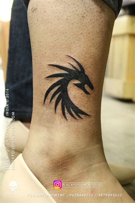 Simple Dragon Tribal Tattoo