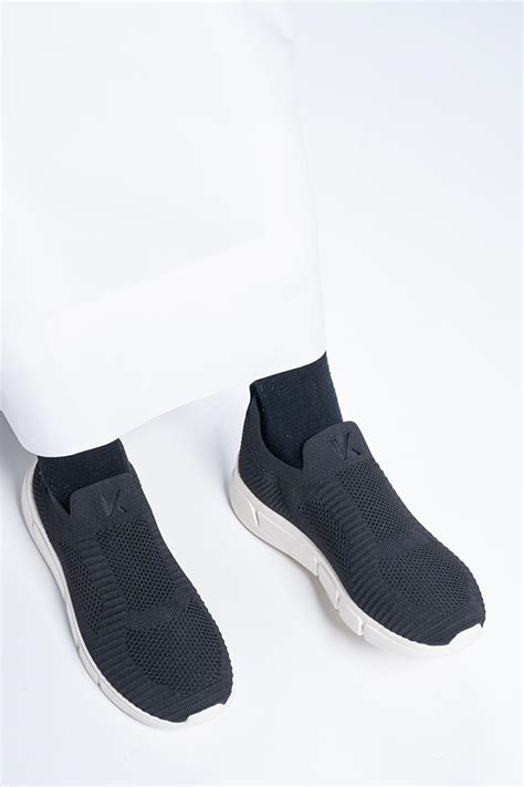 Slip On Black On White Flain® All Rights Reserved