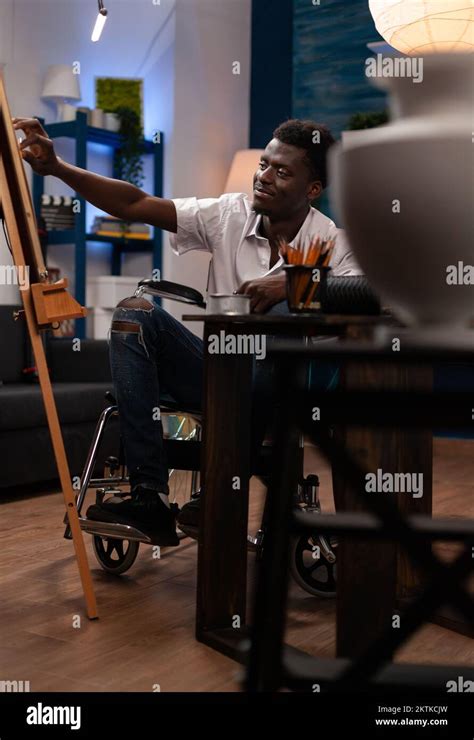 Artist Living With Disability Making Vase Drawing On Canvas Happy