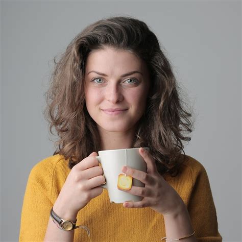 Premium Photo Girl Holding Cup Of Tea