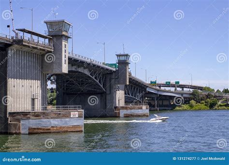 Morrison Bridge With As Speed Boat On A Sunny Summer Day On The