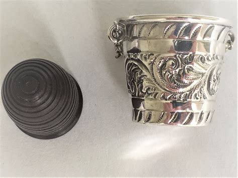 An Edwardian Silver Thimble Bucket And Treen Thimble