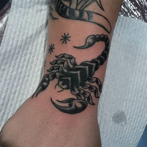 Scorpion Wrist Tattoo