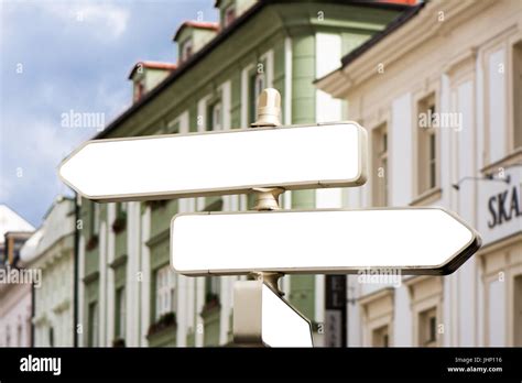 Blank Guide Post In The City Behind Building With Classical Architecture 3 Empty Rectangular